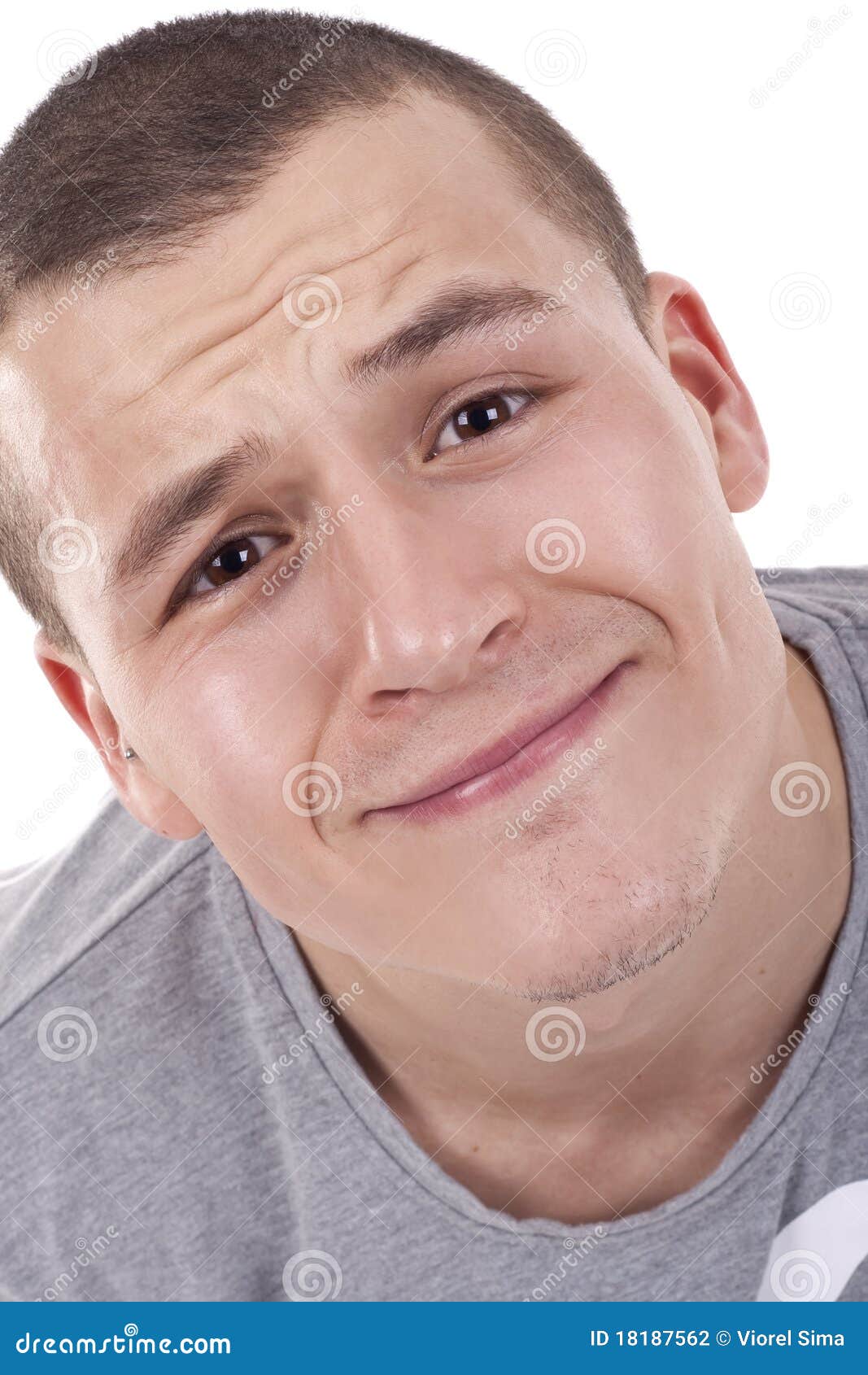 Handsome Young Man Making a Funny Face Stock Photo - Image of light ...