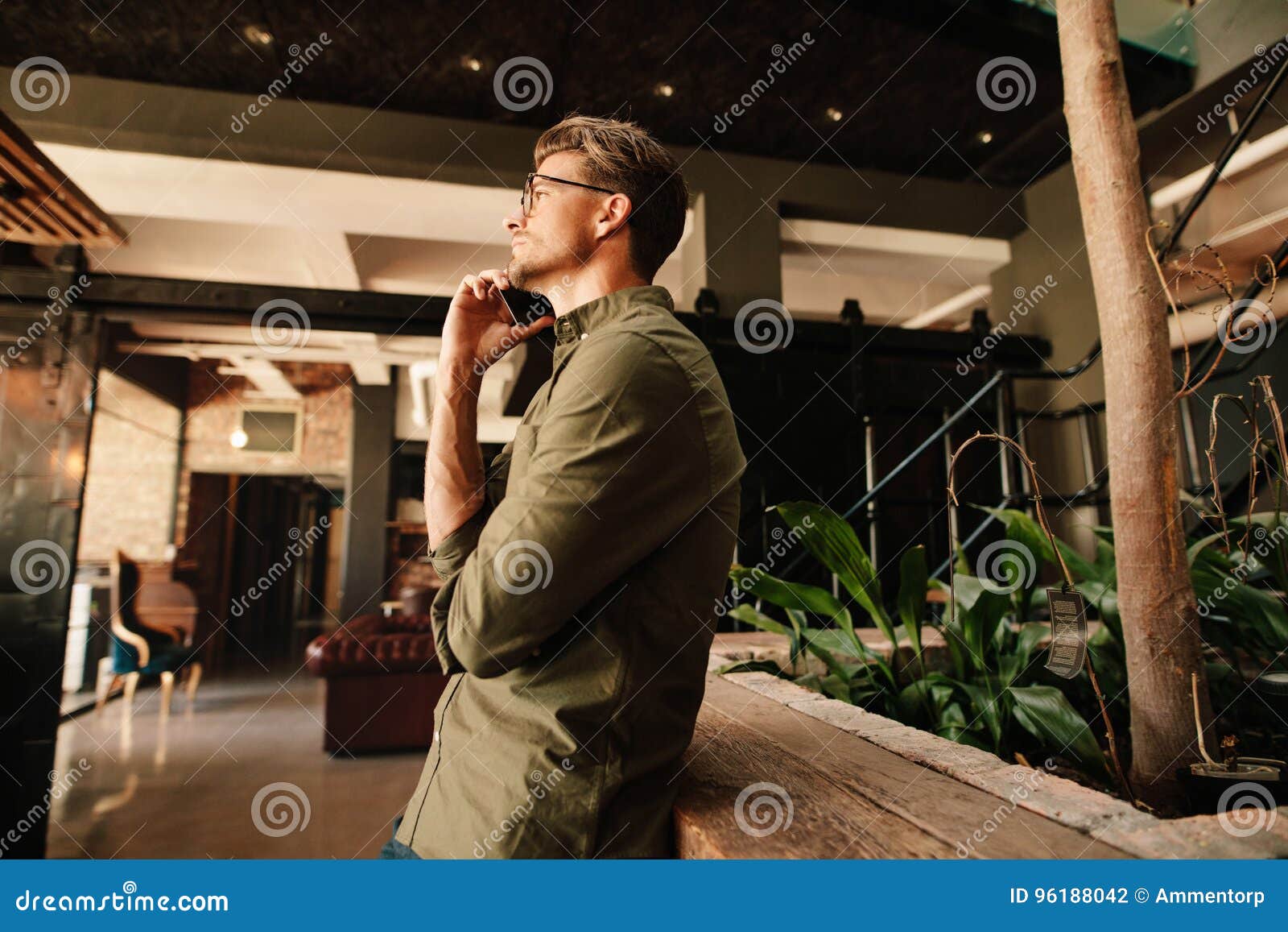 Handsome Young Man Making a Phone Call Stock Photo - Image of ...