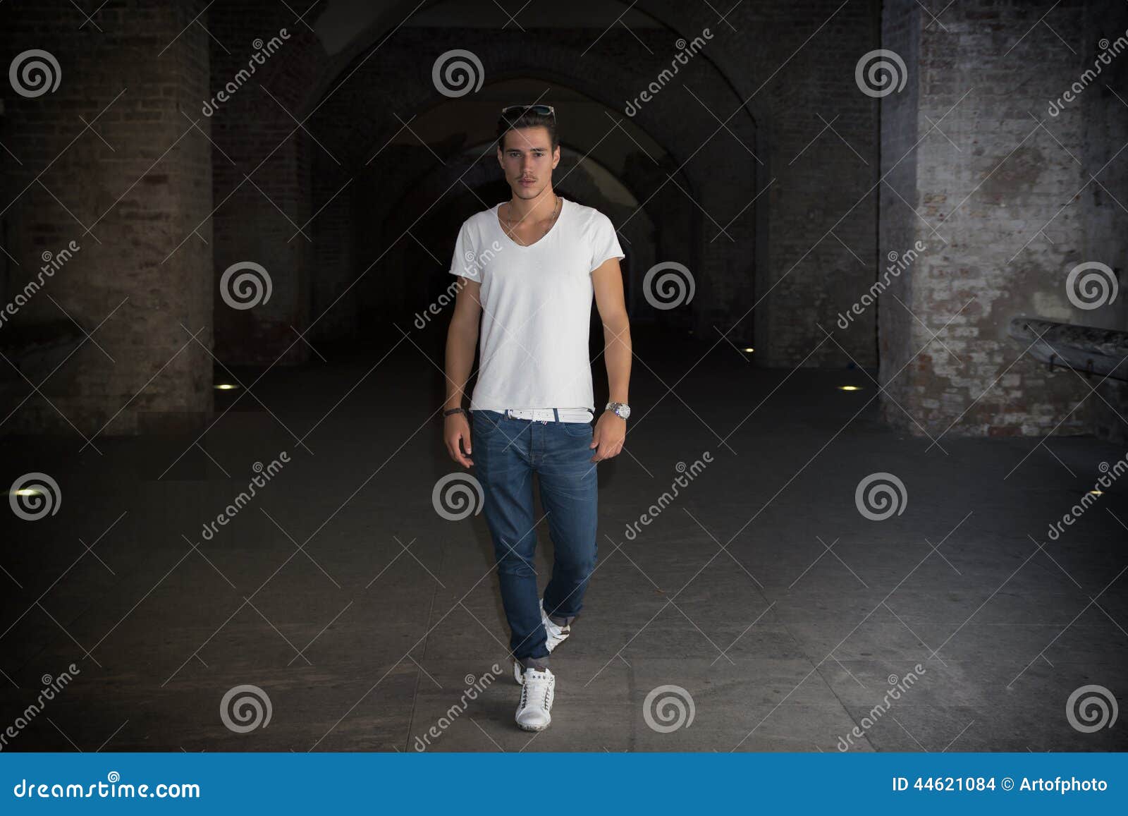 Handsome Young Man in Old Building Walking Inside Gallery Stock Photo ...