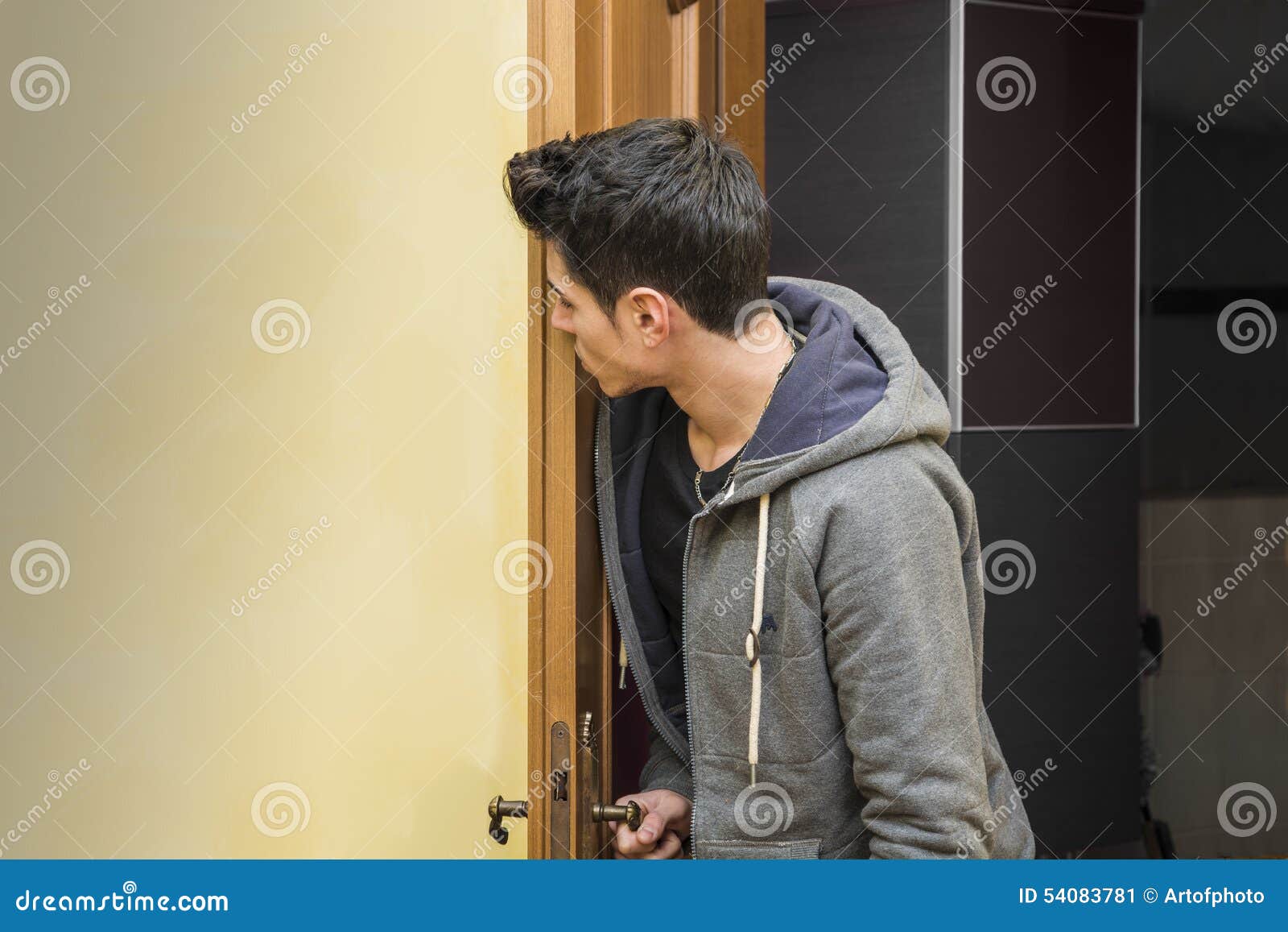 Handsome Young Man Opening Door To Exit Stock Image - Image of ...