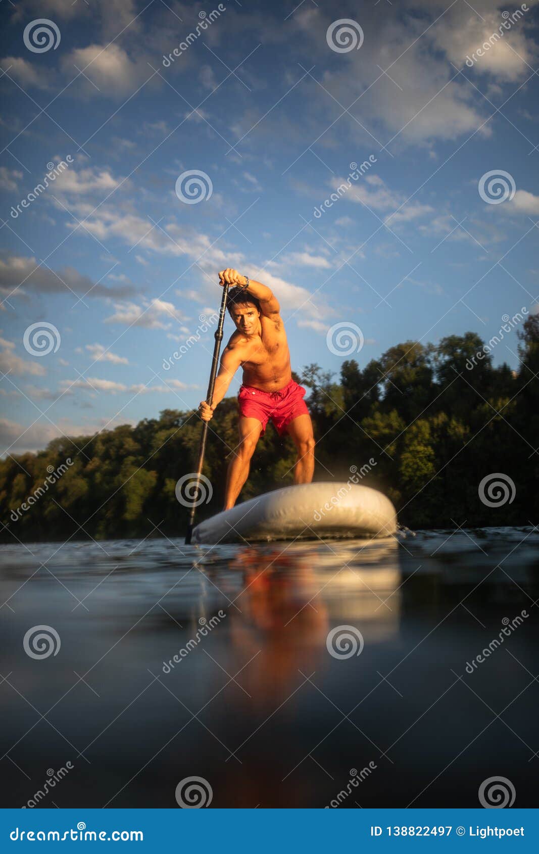 Handsome Young Man on a Paddle Board Stock Image - Image of nature ...