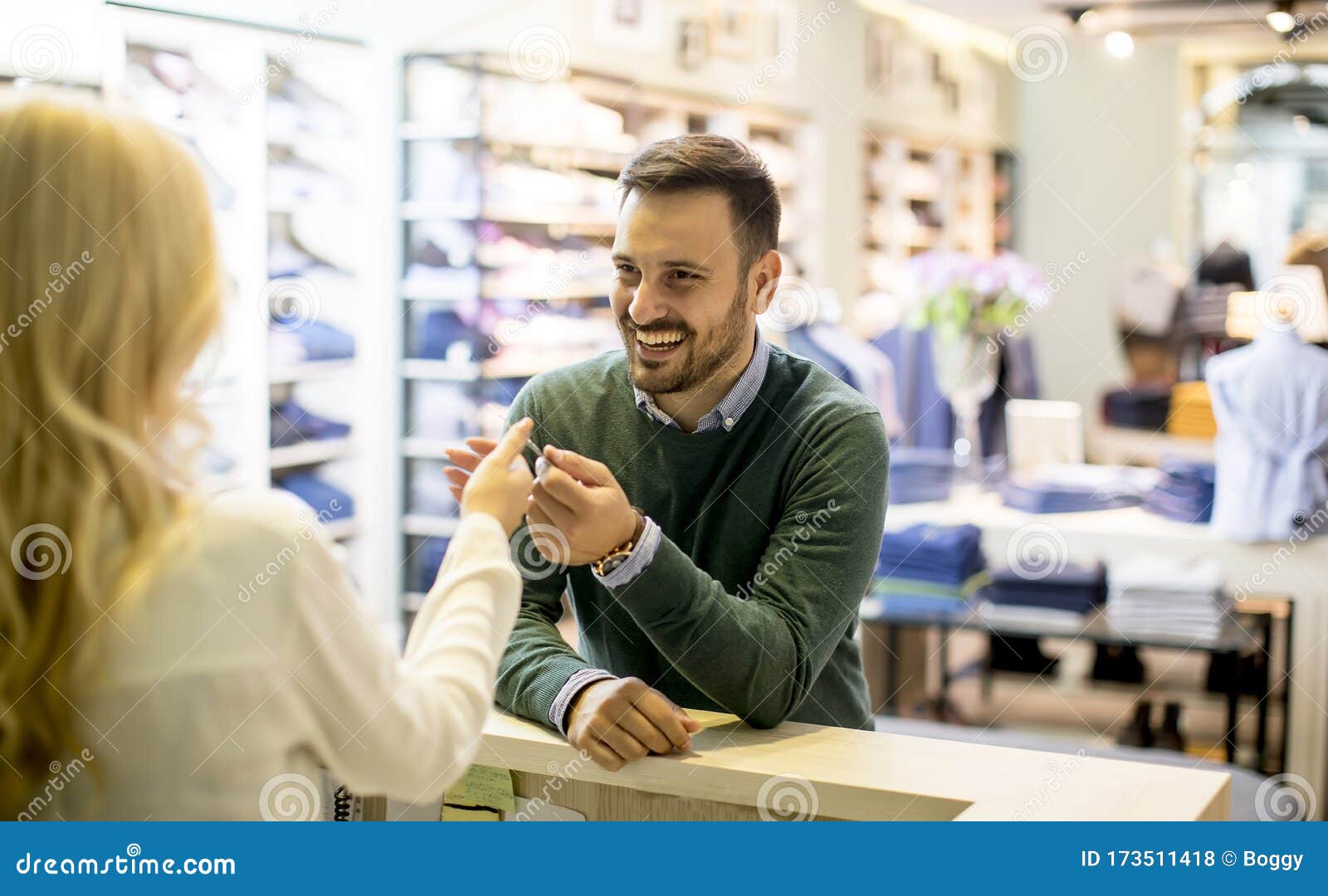 Handsome Young Man Paying with Credit Card in the Clotging Store Stock ...
