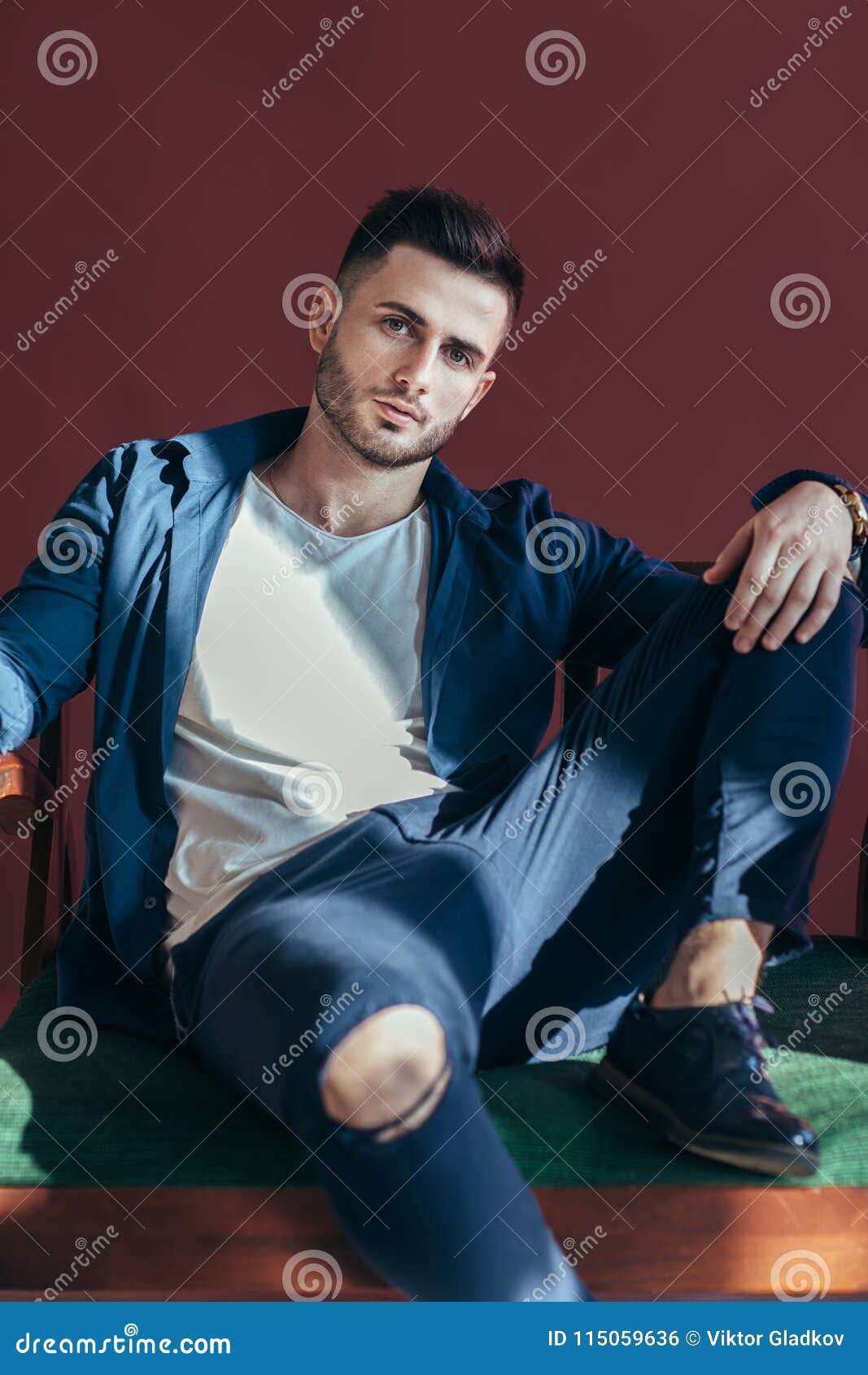 Handsome Young Man Posing in Relax Pose in Studio Stock Photo - Image ...
