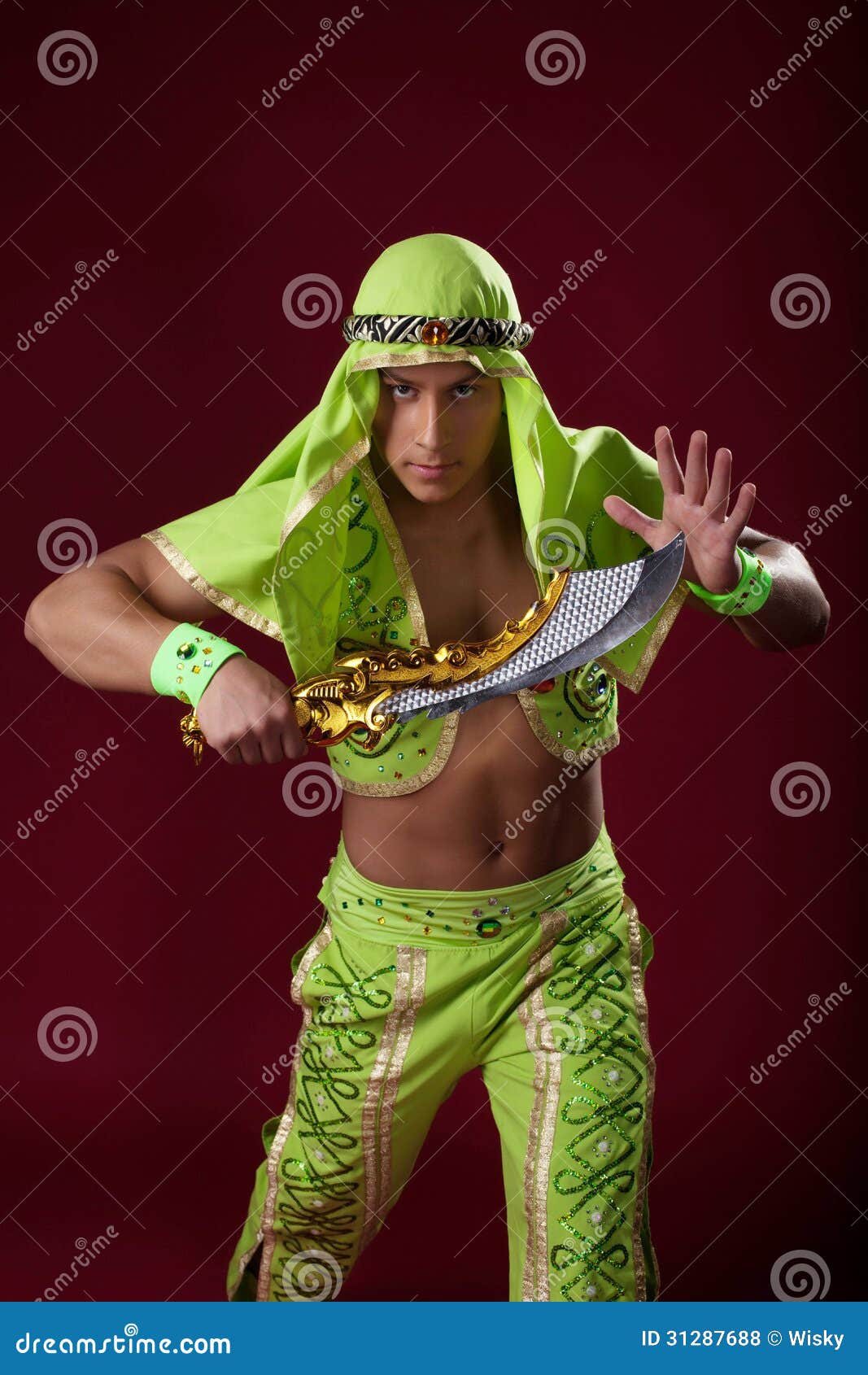 Handsome Young Man Posing with Saber in Studio Stock Photo - Image of ...