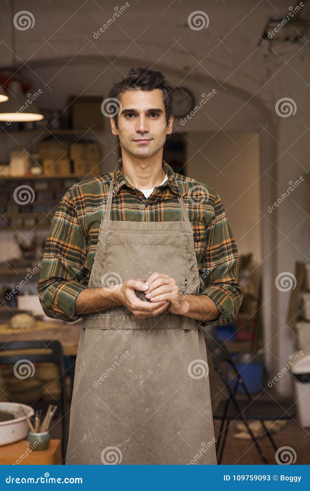 Handsome Young Man in Pottery Workshop Holding Clay Stock Image - Image ...
