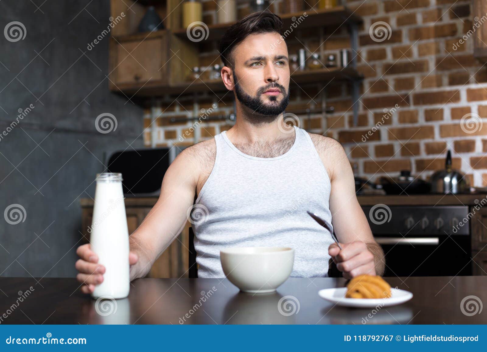 Handsome Young Man Pouring Milk from Bottle Stock Image - Image of pour ...