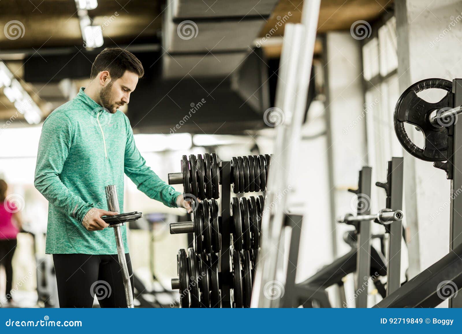 Young Man Preparing for a Workout in the Gym Stock Image - Image of ...