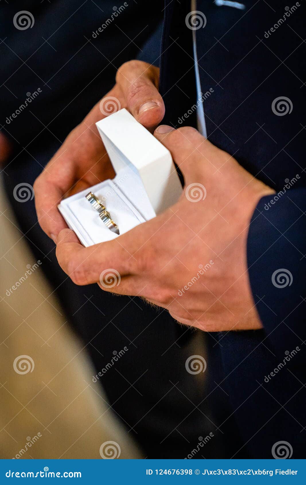 Handsome Young Man Presenting Something in a Small Box, Wedding Rings ...