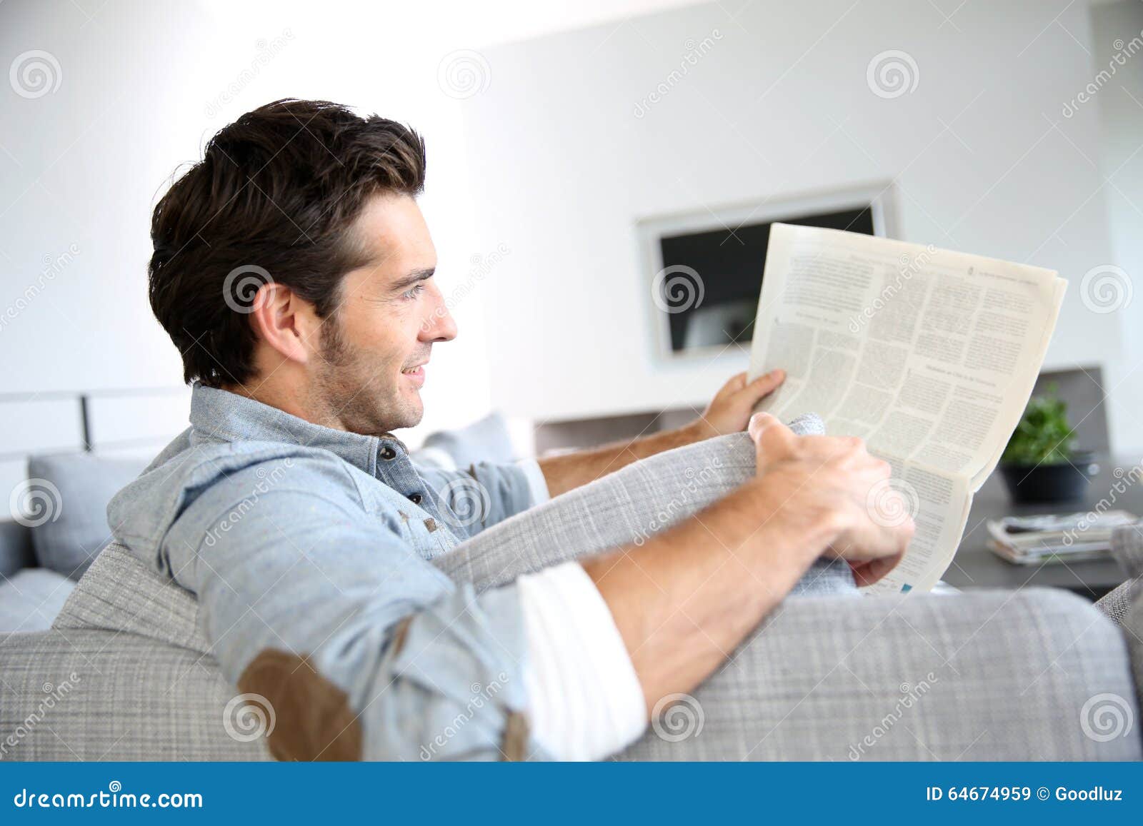 Handsome Young Man Reading Newspaper Stock Image - Image of young ...