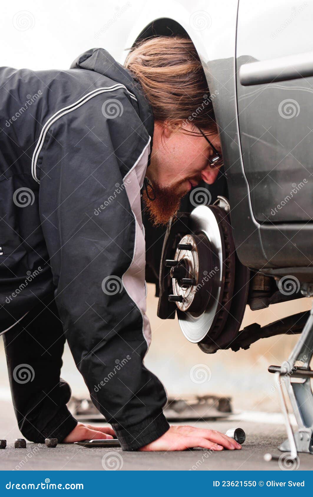 Handsome Young Man Repairing Car Stock Photo - Image of looking, tool ...