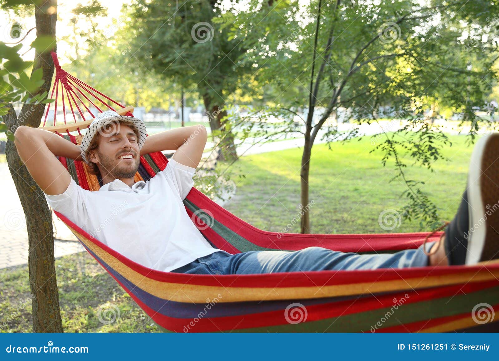 Handsome Young Man Resting in Hammock Outdoors Stock Image - Image of ...