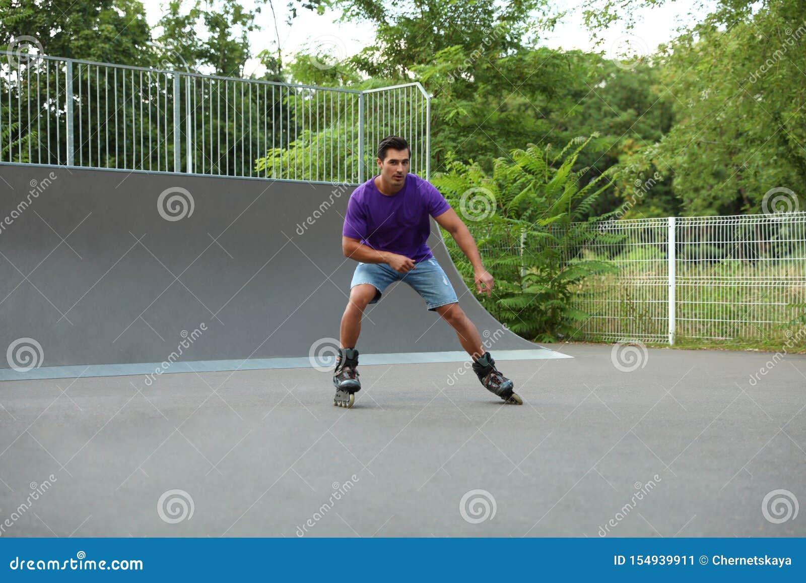 Handsome Young Man Roller Skating Stock Image - Image of fast, inline ...