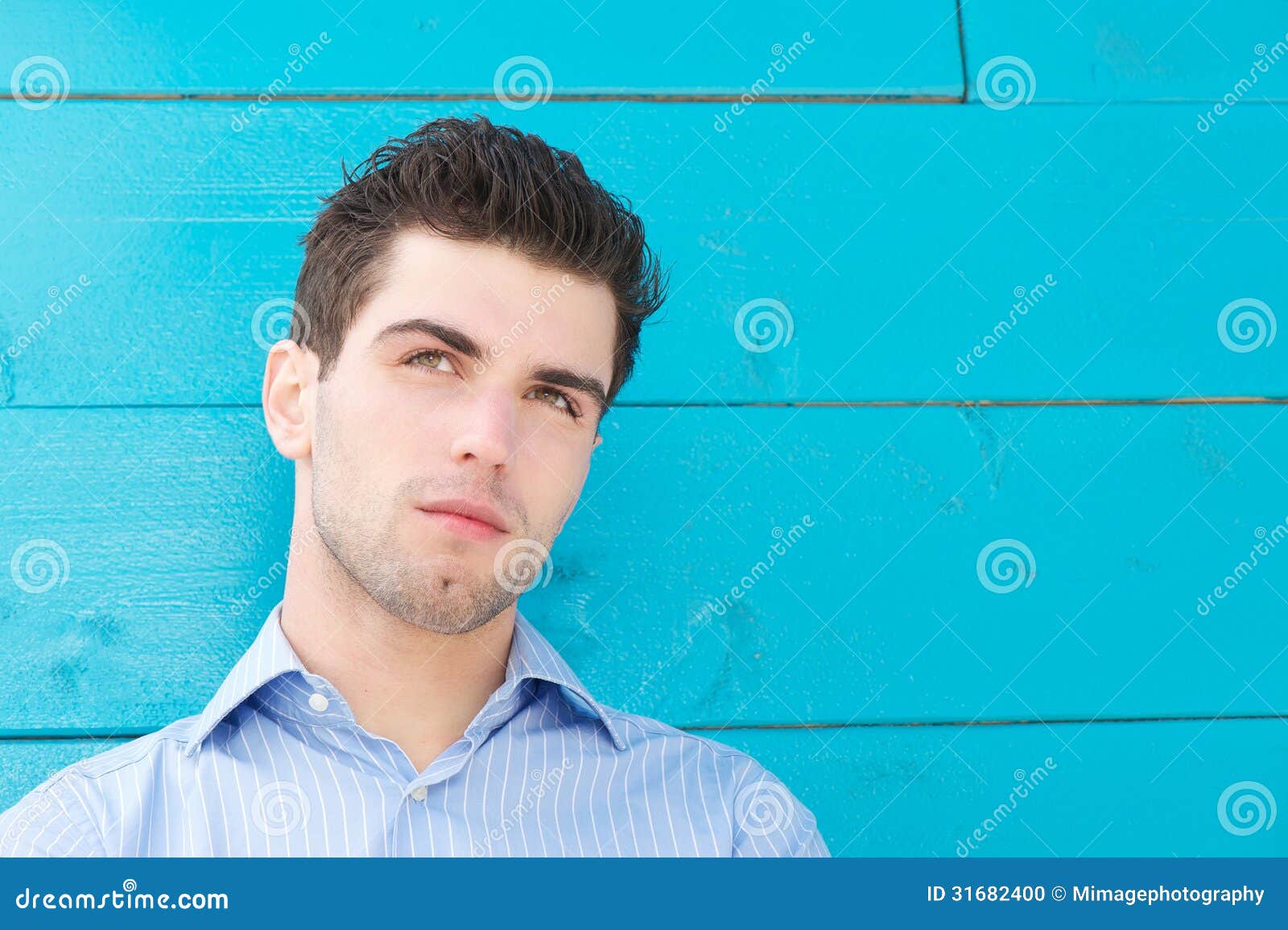 Handsome Young Man with Serious Expression on Face Stock Photo - Image ...
