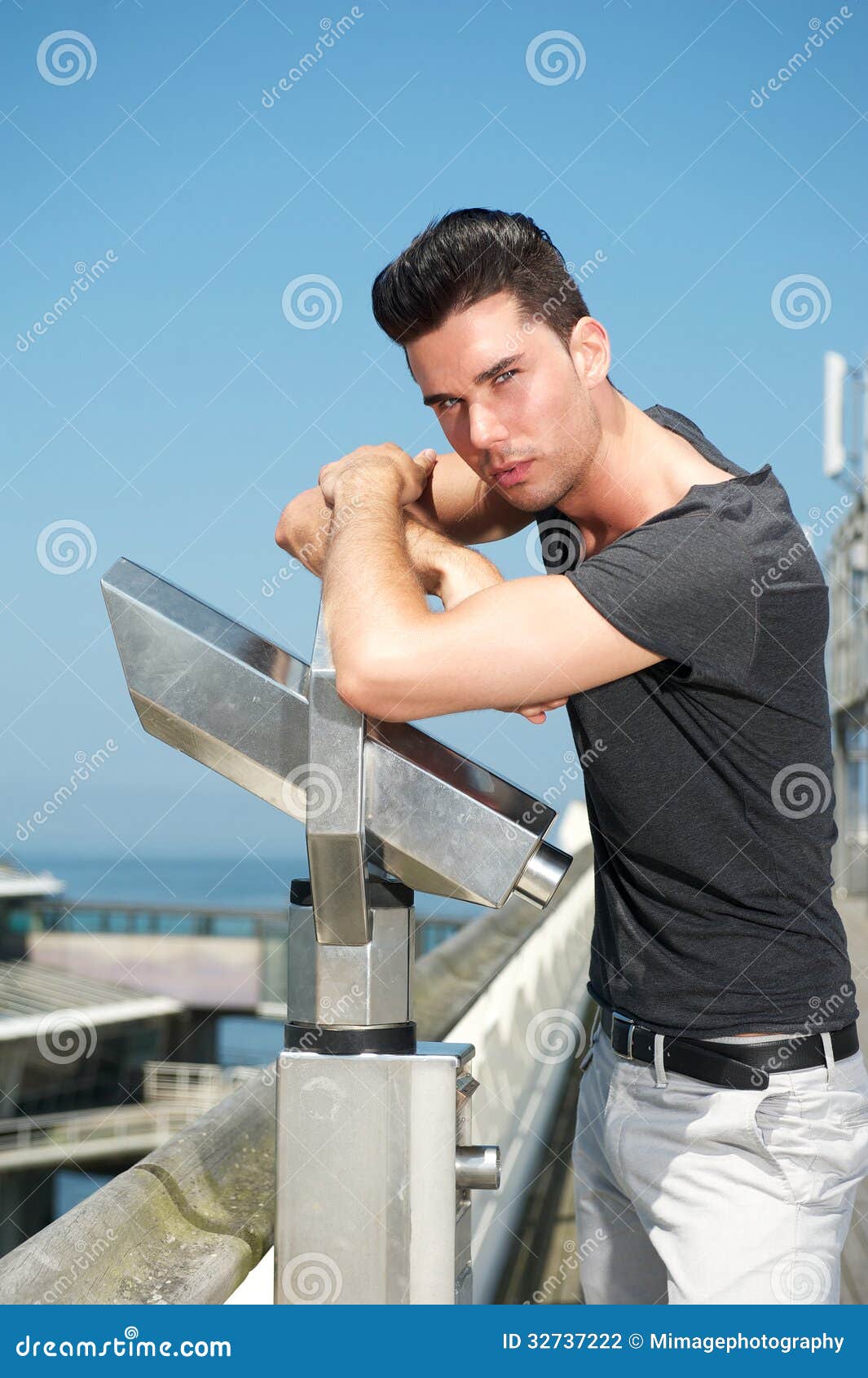 Handsome Young Man with Serious Expression Stock Photo - Image of ...