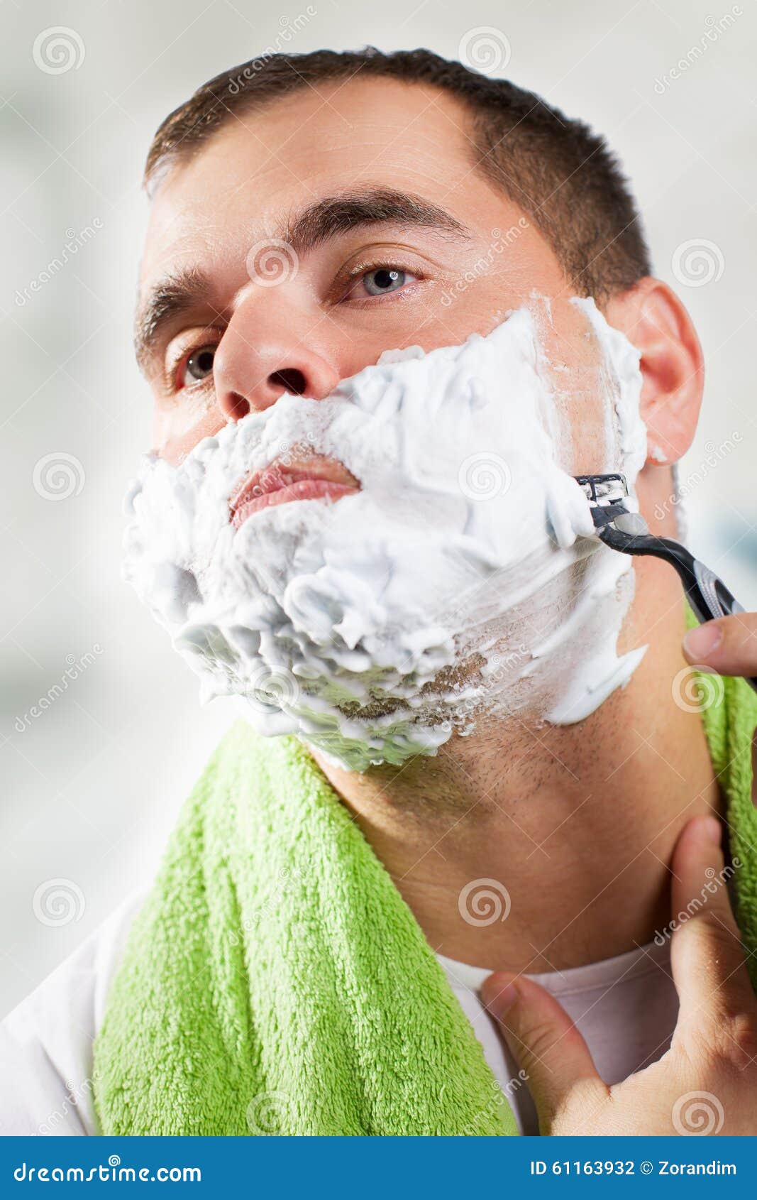 Handsome Young Man is Shaving His Face Stock Photo - Image of portrait ...