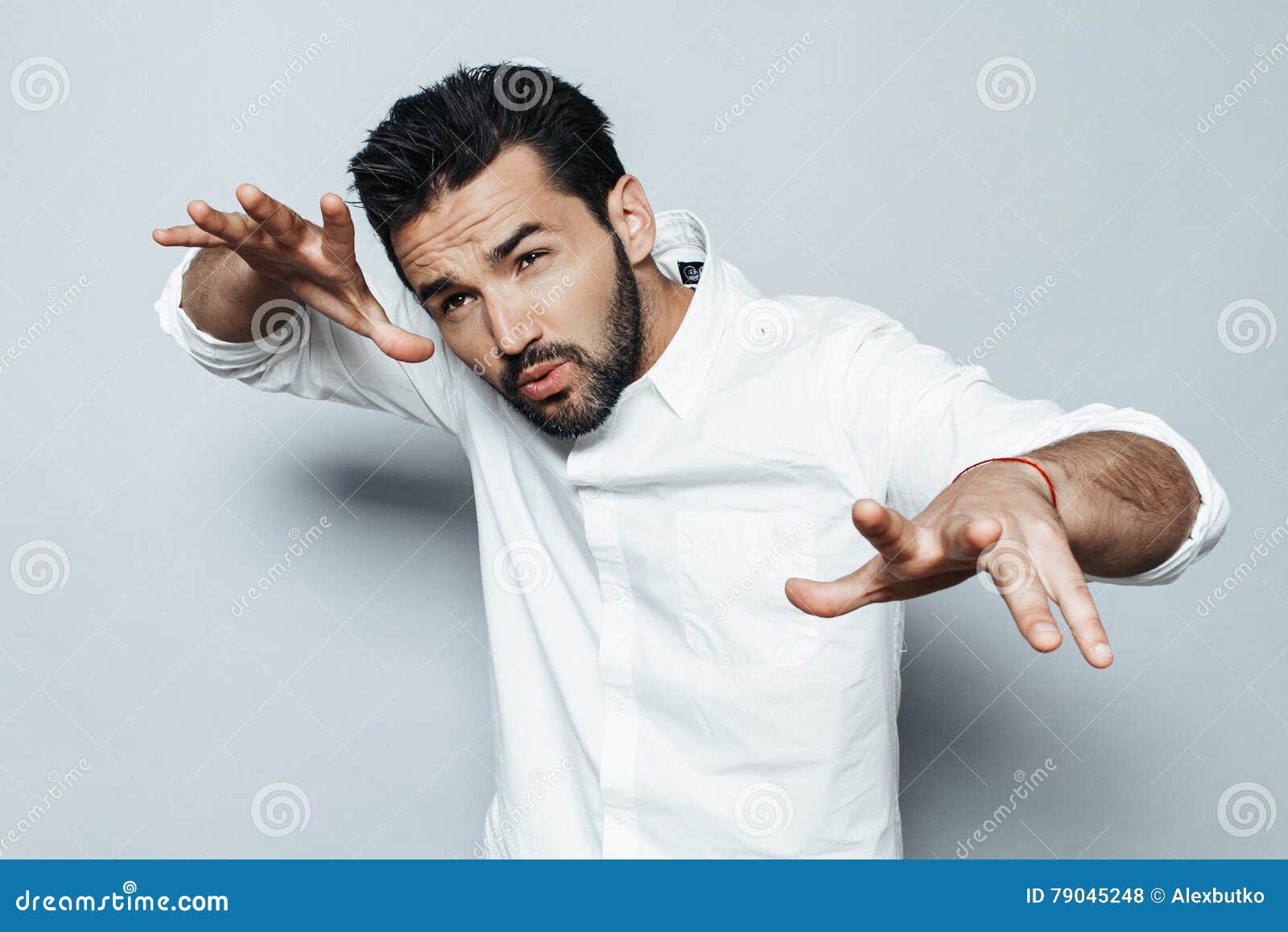 A Handsome Young Man Shows Emotions Stock Photo - Image of expressions ...