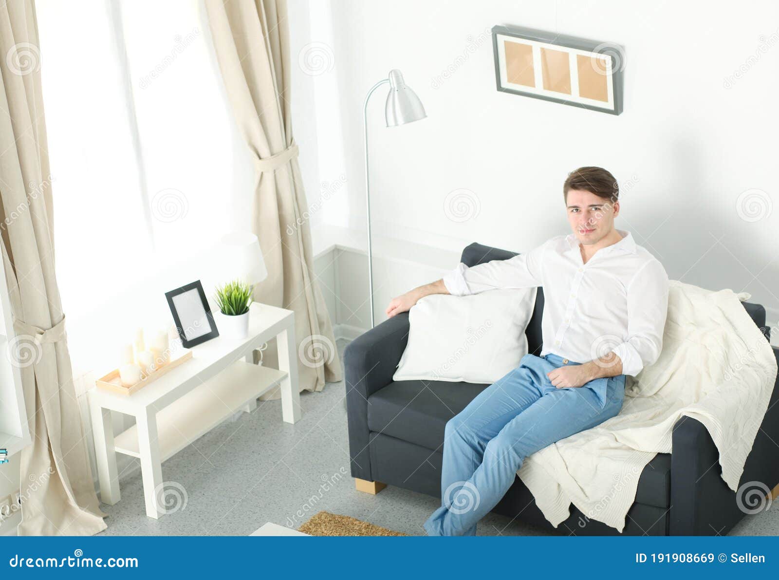 Handsome Young Man Sitting and Working on Laptop Computer Stock Image ...