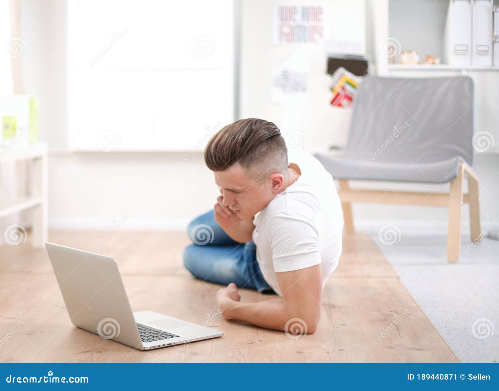 Handsome Young Man Sitting and Working on Laptop Computer Stock Image ...