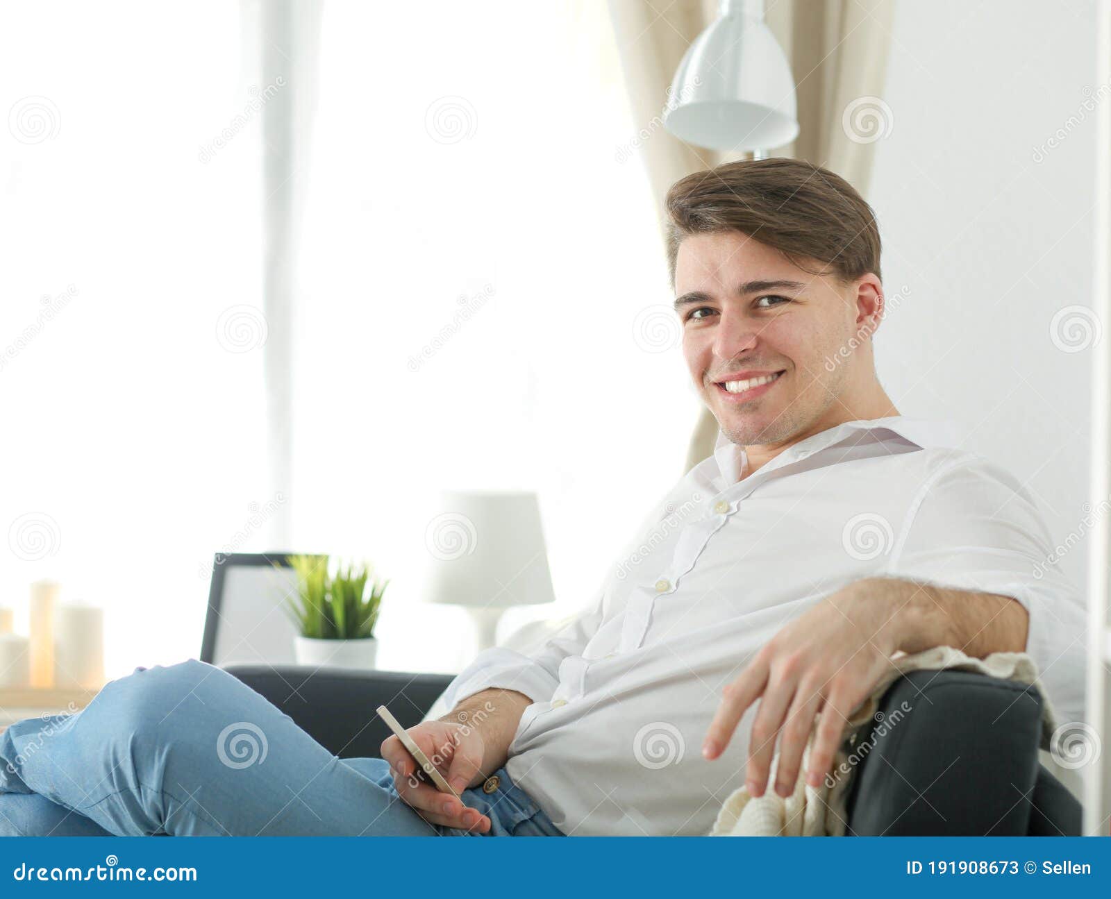 Handsome Young Man Sitting and Working on Laptop Computer Stock Image ...
