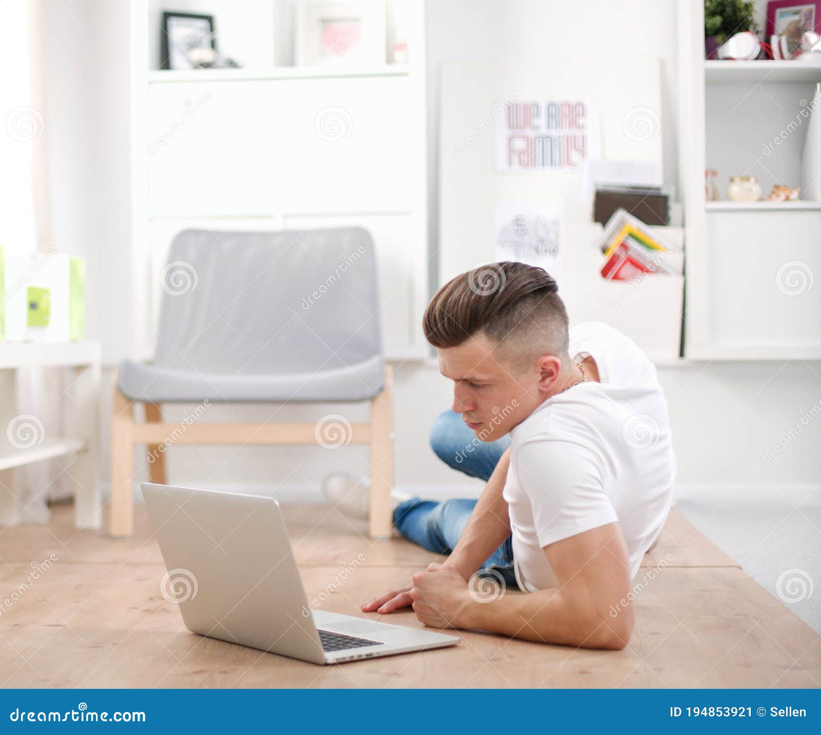 Handsome Young Man Sitting and Working on Laptop Computer Stock Image ...