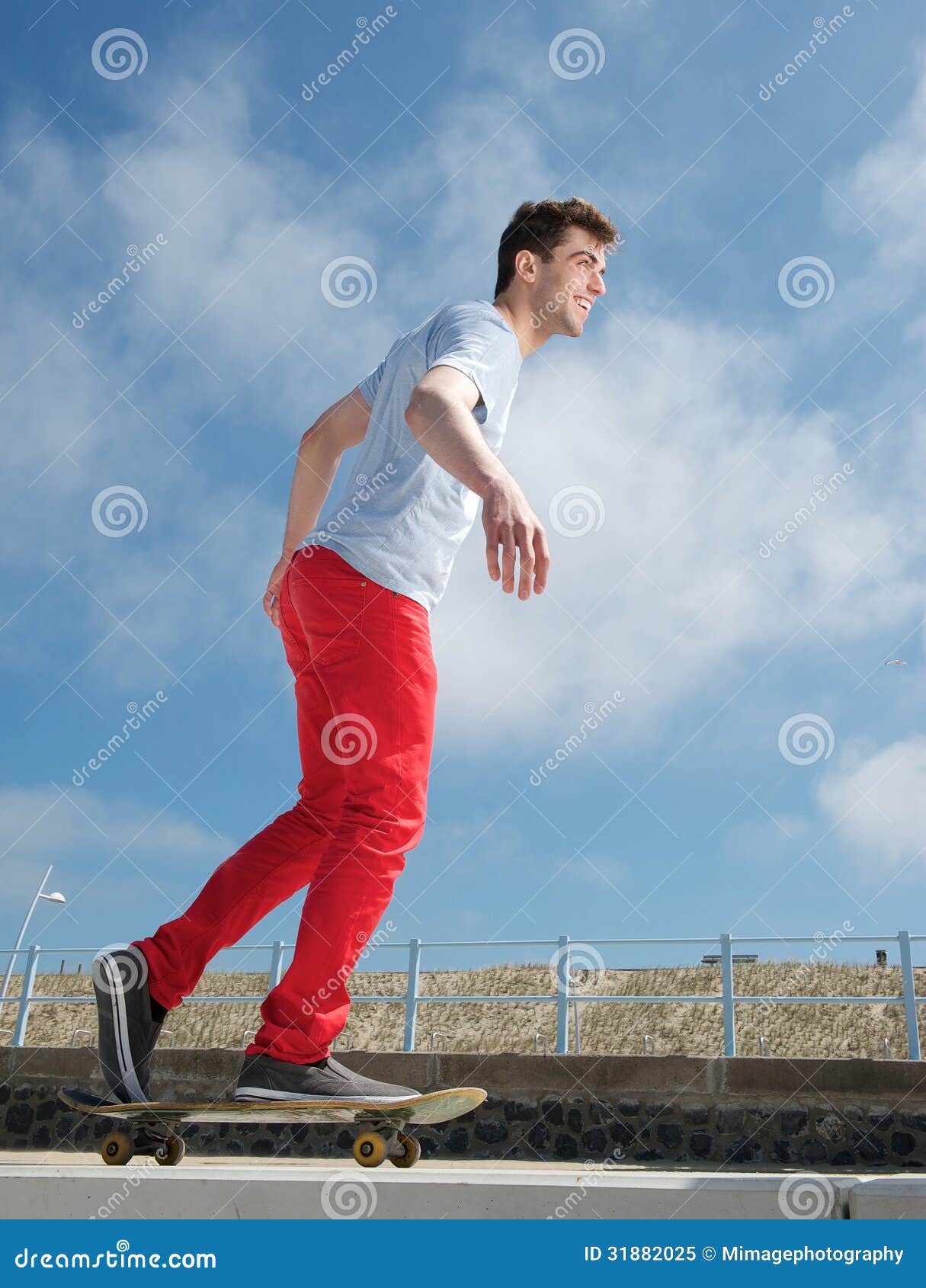 Handsome Young Man Skateboarding Outdoors in Summer Stock Image - Image ...