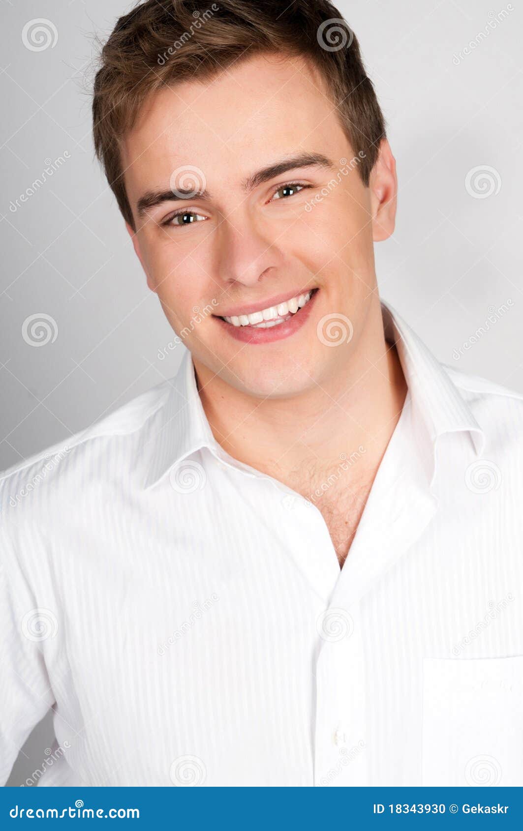 Handsome young man smiles stock photo. Image of portrait - 18343930