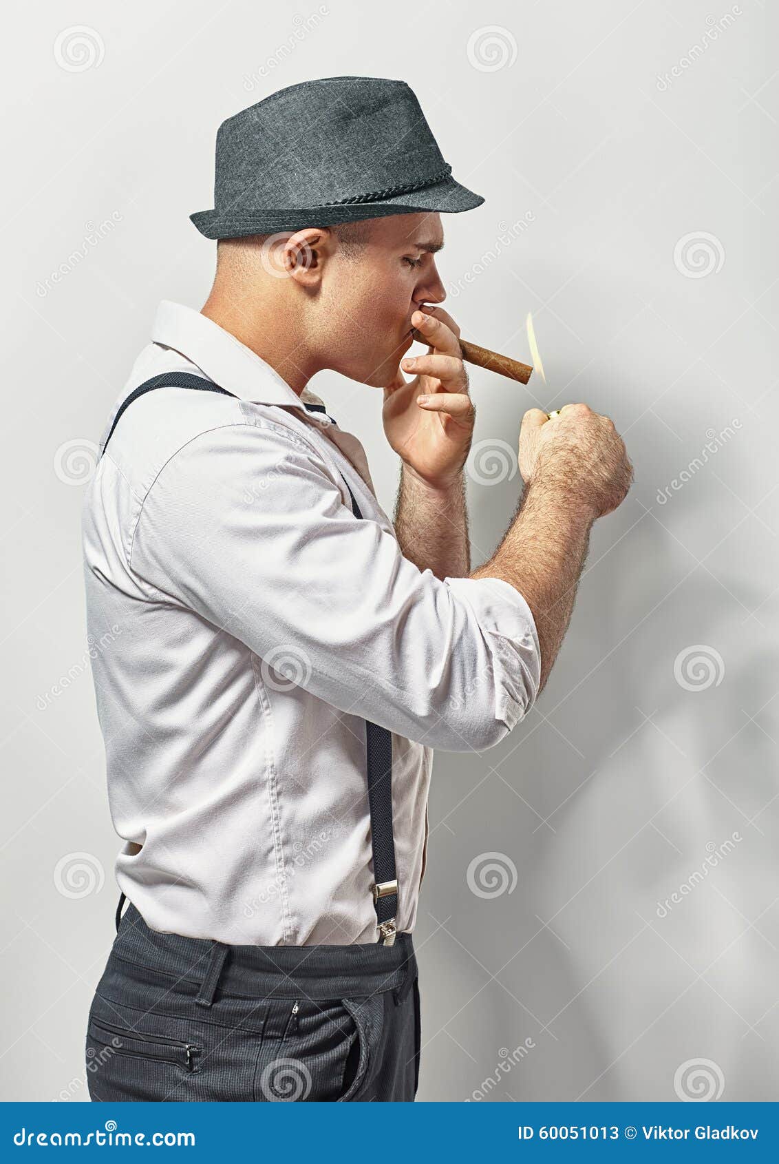 Handsome Young Man Smoking Cigar Stock Image - Image of dressed, habit ...