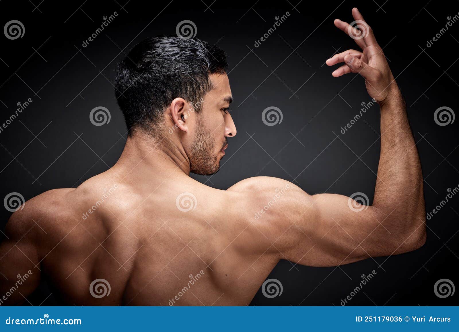 Body Goals on Point. a Handsome Young Man Standing Alone and Posing ...