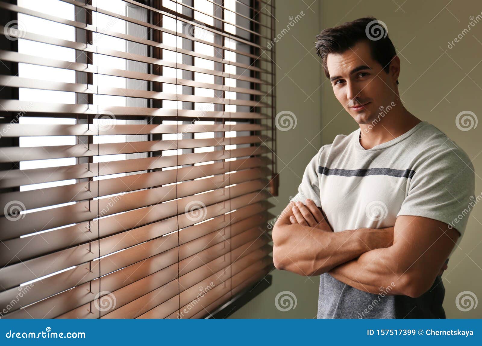 Handsome Young Man Standing Near Window Stock Image - Image of ...