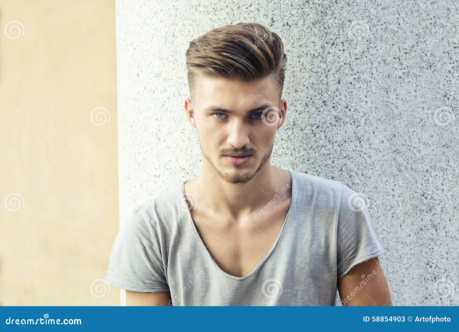 Handsome Young Man Standing Outdoors Against Stock Image - Image of ...