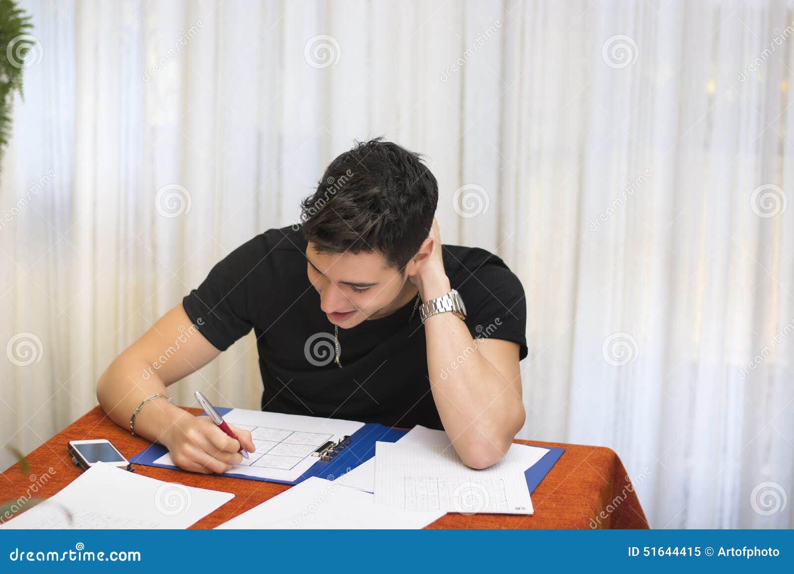 Handsome Young Man Studying or Doing Homework Stock Image - Image of ...