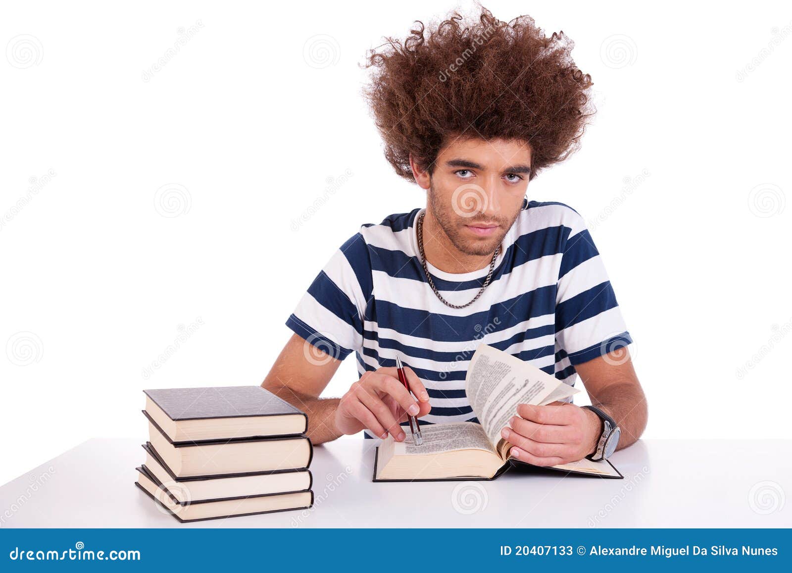 Handsome Young Man Studying and Reading a Book on Stock Image - Image ...