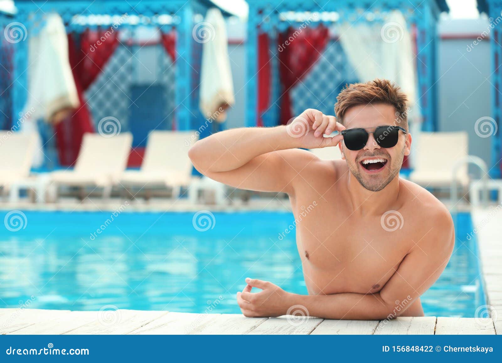 Handsome Young Man in Swimming Pool on Day Stock Photo - Image of slim ...