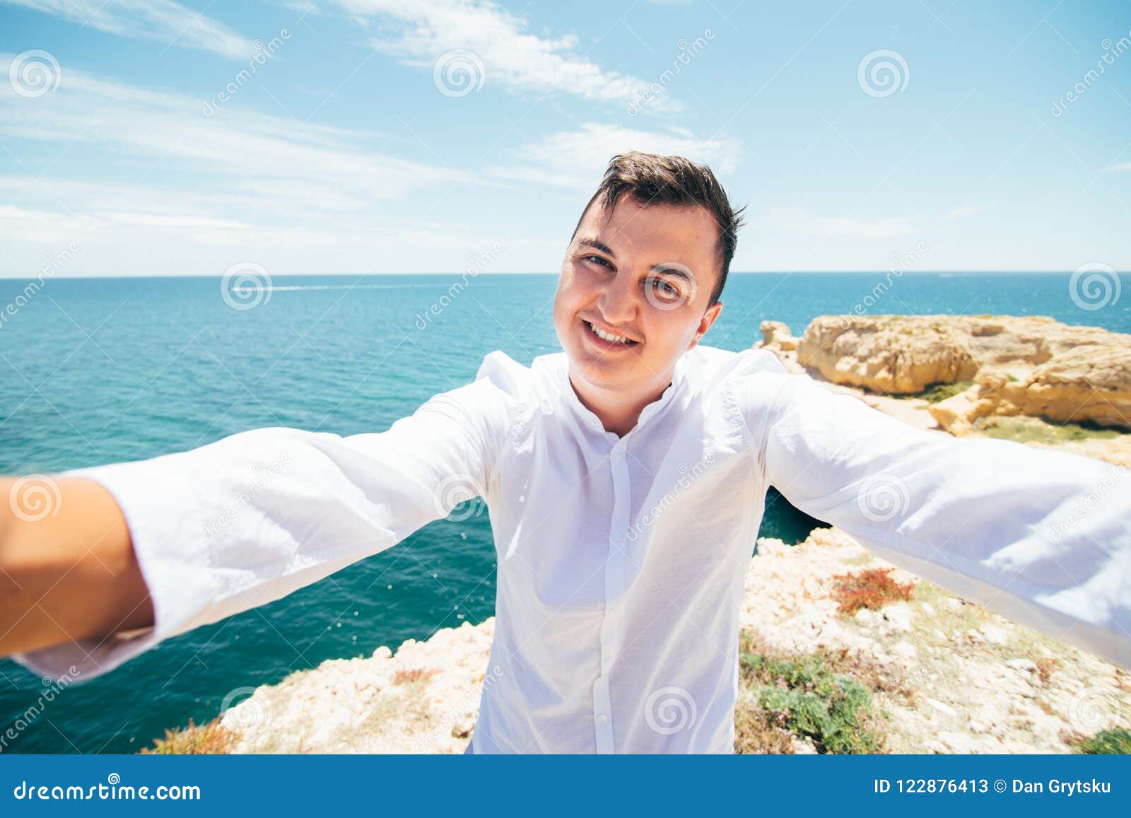 Handsome Young Man Taking A Selfie From Camera On Vacation On Ocean And