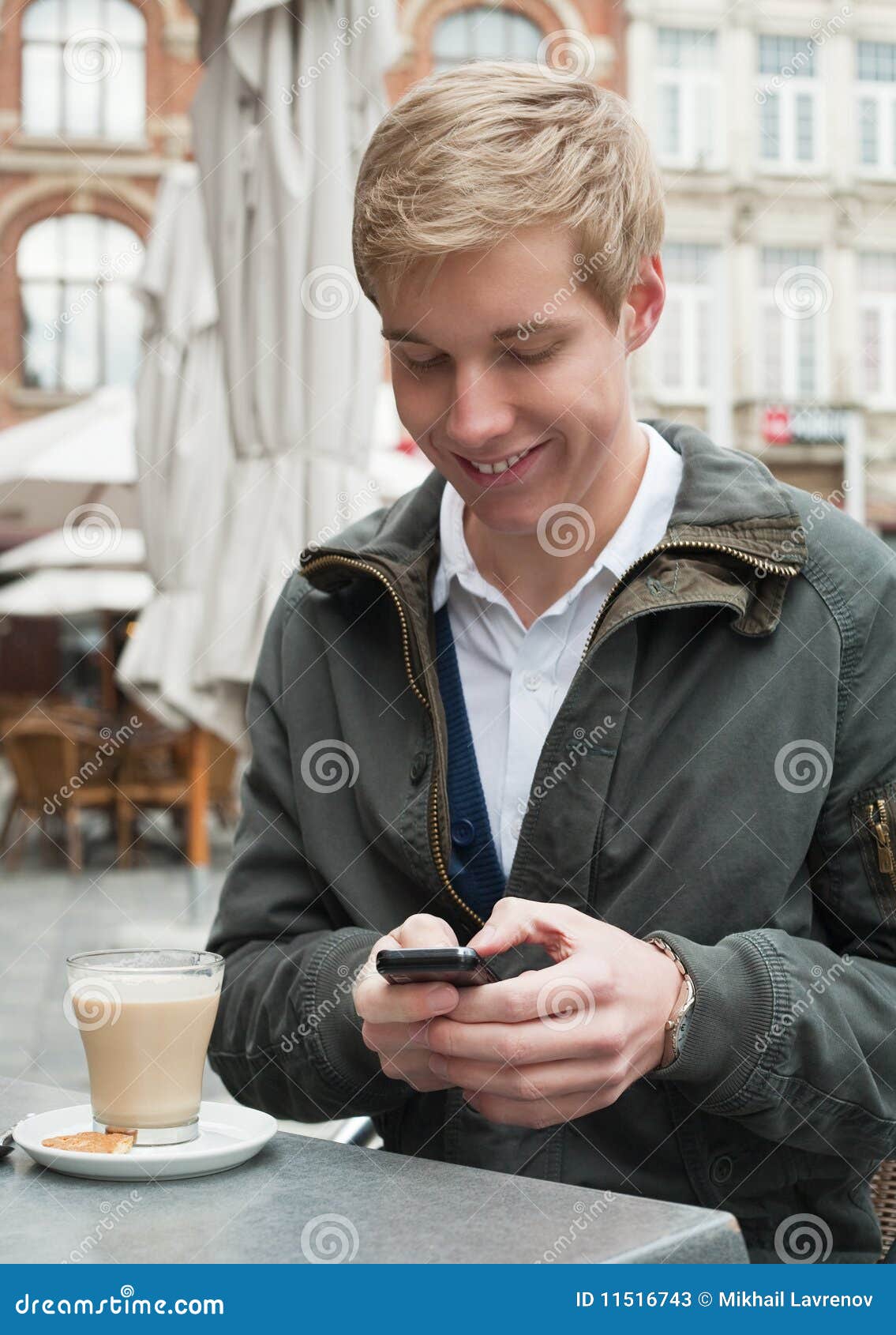 Handsome Young Man Texting a Message Stock Image - Image of reading ...