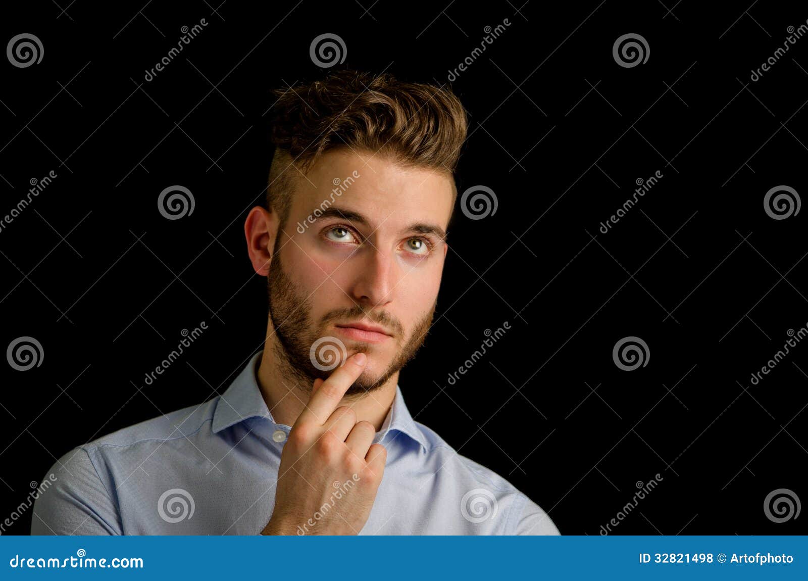 Handsome Young Man Thinking, Looking Up Stock Photo - Image of ...