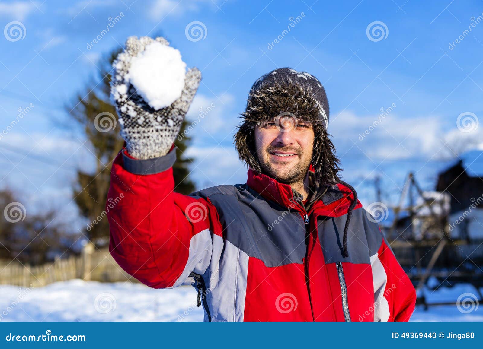 Handsome Young Man Throwing a Snowball Stock Photo - Image of season ...