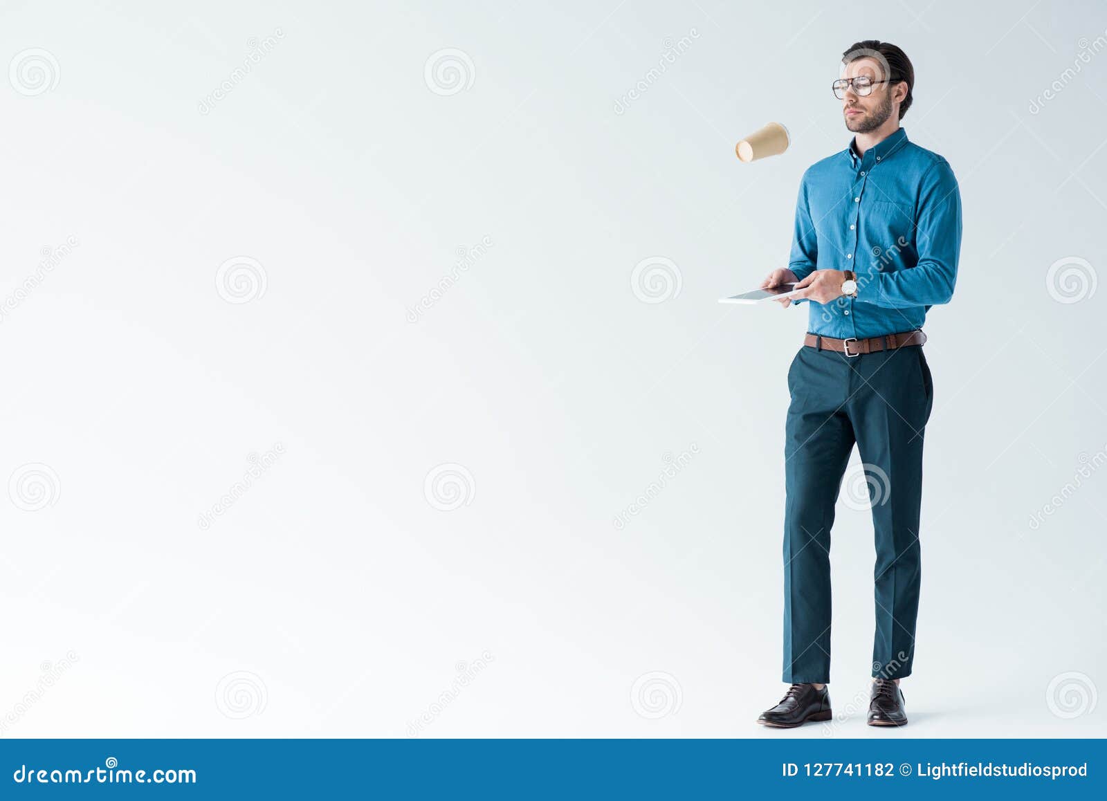 Handsome Young Man Throwing Up Paper Cup of Coffee with Tablet Stock ...