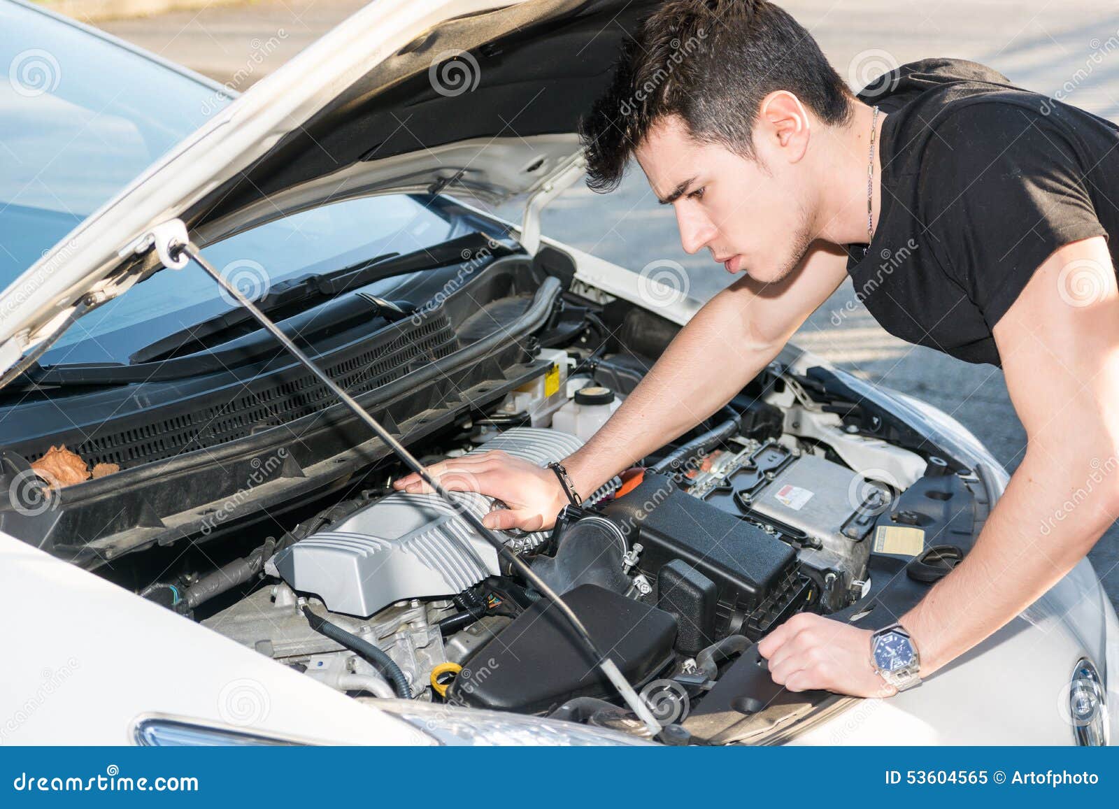 Handsome Young Man Trying To Repair a Car Engine Stock Image - Image of ...