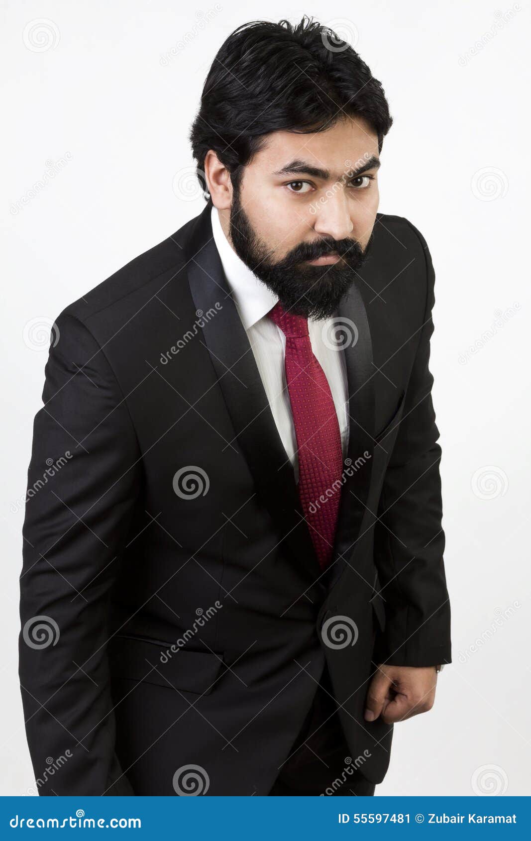 Handsome Young Man in a Tuxedo Leaning Forward Stock Image - Image of ...