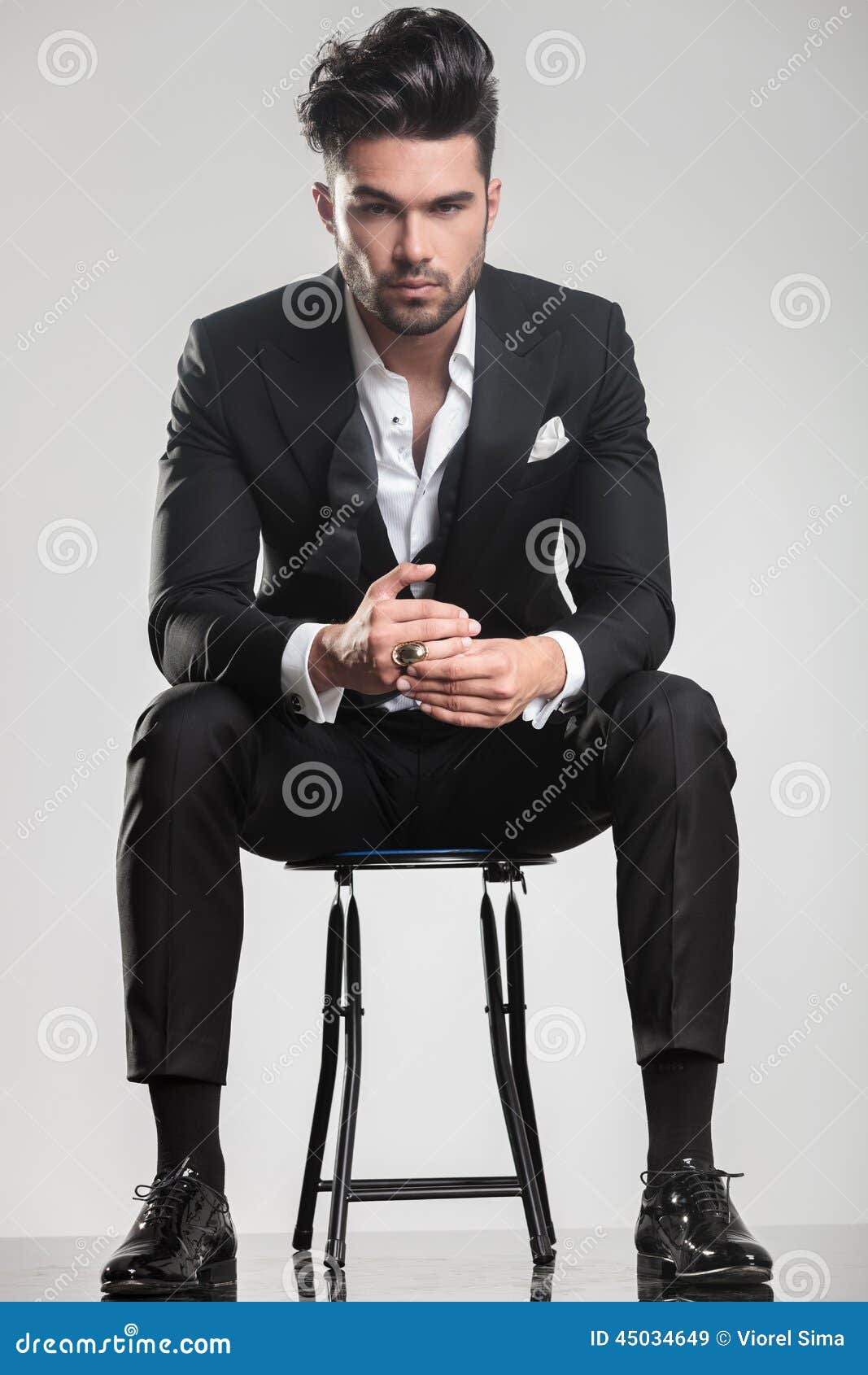 Handsome Young Man in Tuxedo Sitting on a Stool Stock Image - Image of ...