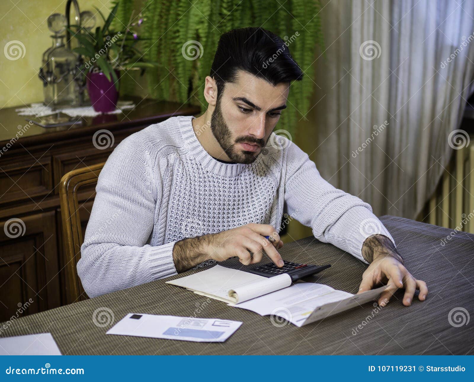 Handsome Man Accounting at Table Stock Image - Image of calculating ...