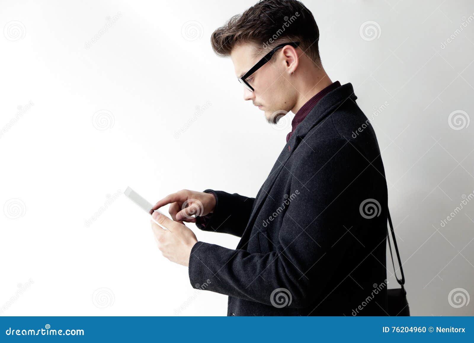 Handsome Young Man Using His Digital Tablet. Isolated on White Stock ...
