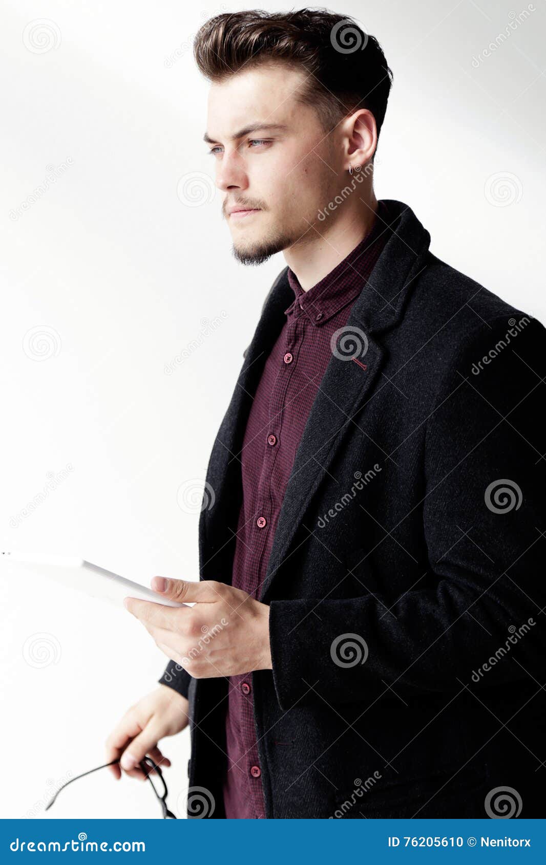 Handsome Young Man Using His Digital Tablet Isolated On White Stock
