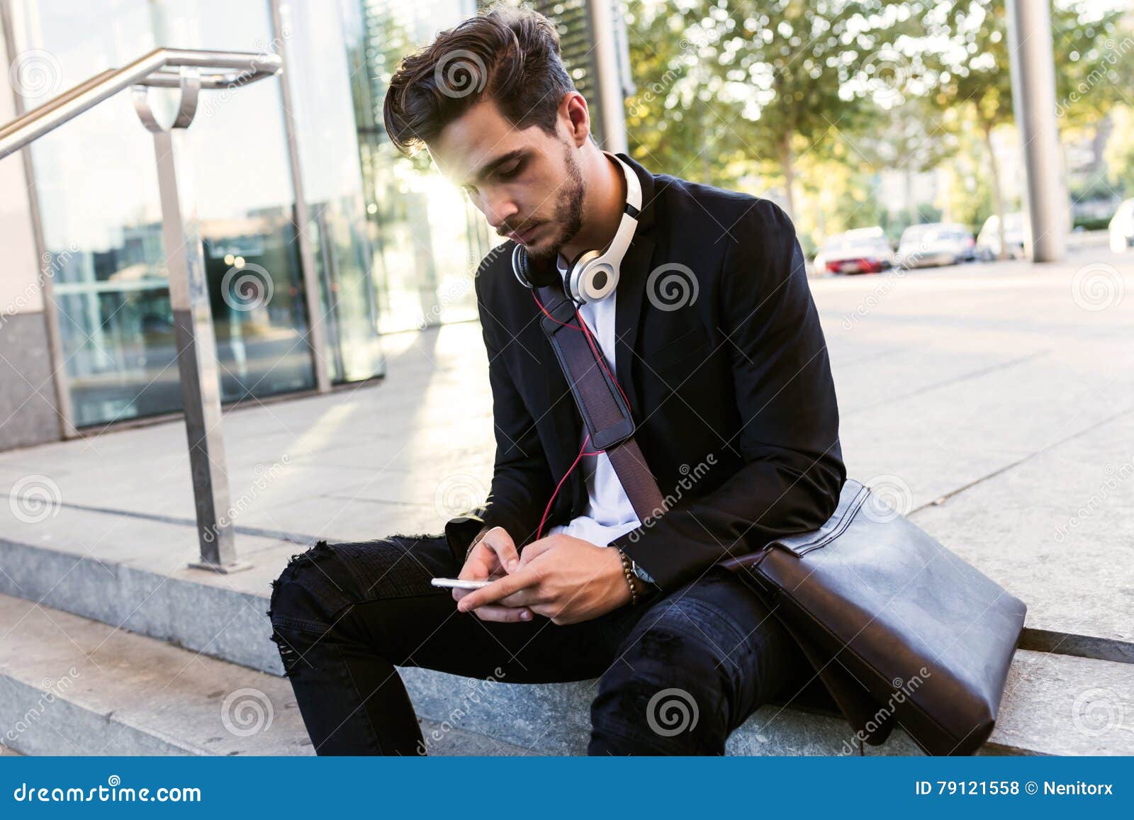 Handsome Young Man Using His Mobile Phone In The Street. Stock Photo ...