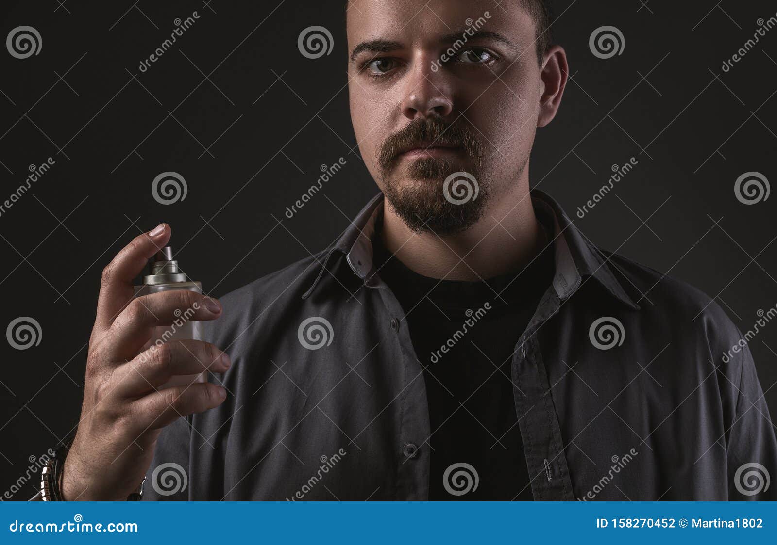 Man with perfume stock photo. Image of casual, fragrance - 158270452