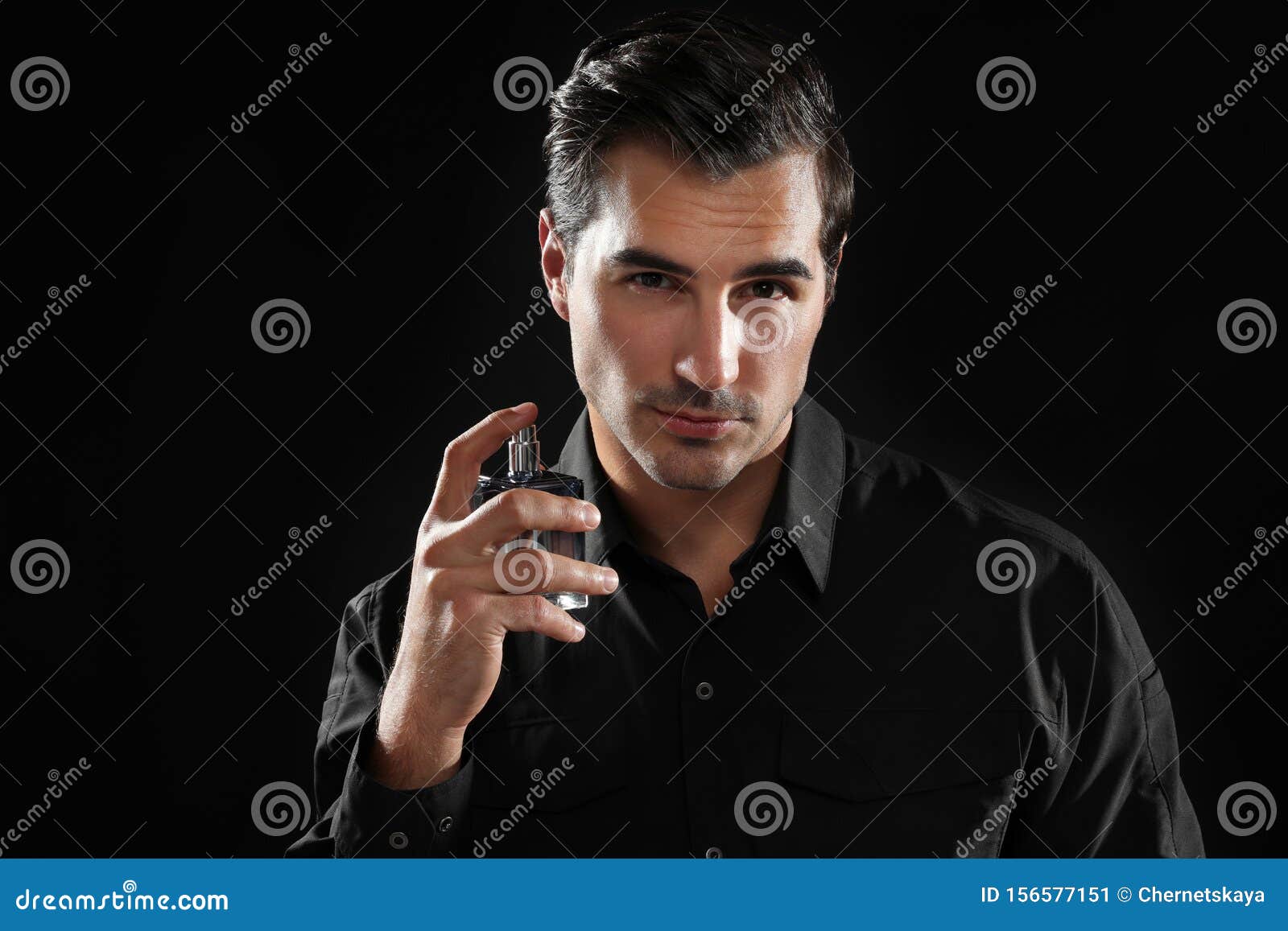 Handsome Young Man Using Perfume Stock Image - Image of applying ...