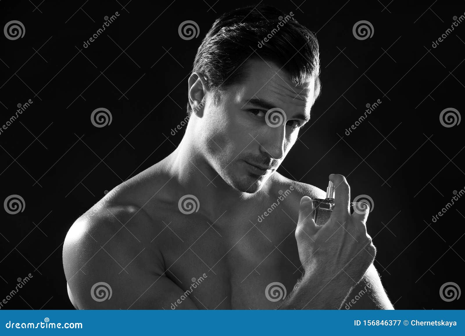 Handsome Young Man Using Perfume Stock Image - Image of fresh, luxury ...