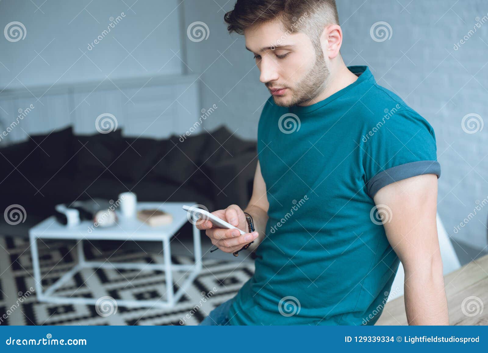 Handsome Young Man Using Smartphone Stock Photo - Image of copyspace ...