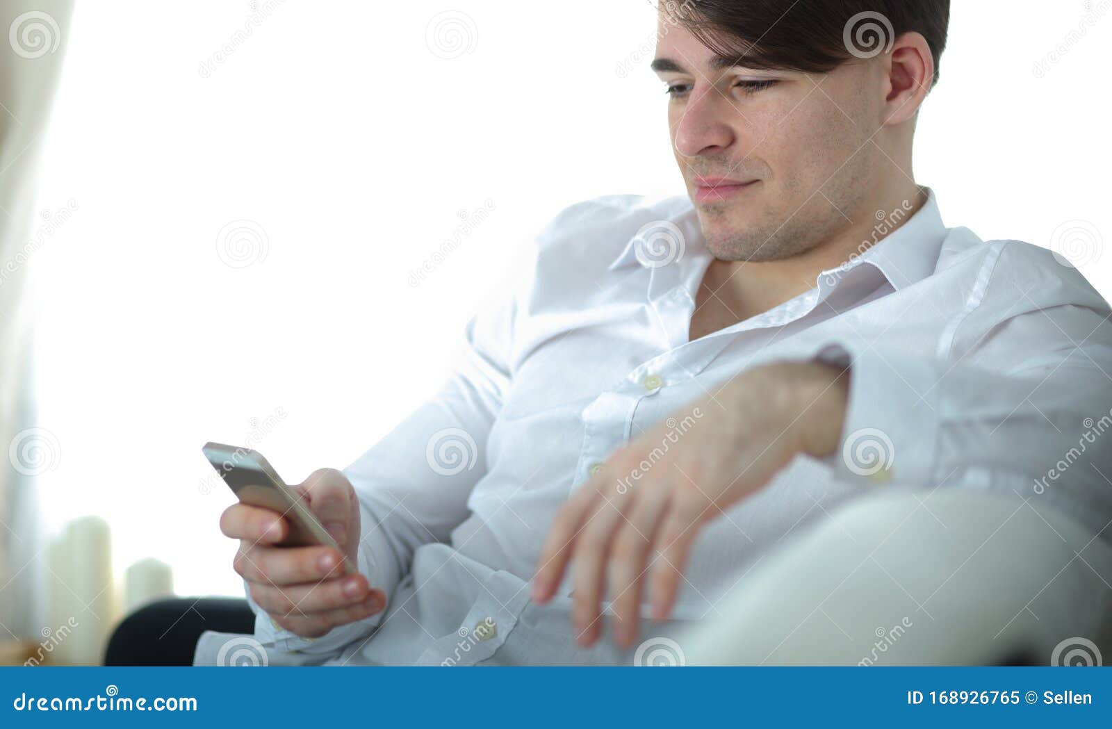 Handsome Young Man Using Smartphone at Home Stock Image - Image of ...